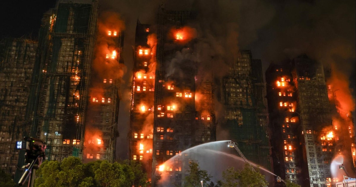 Death toll rises after massive Hong Kong apartment building fire - CBS News