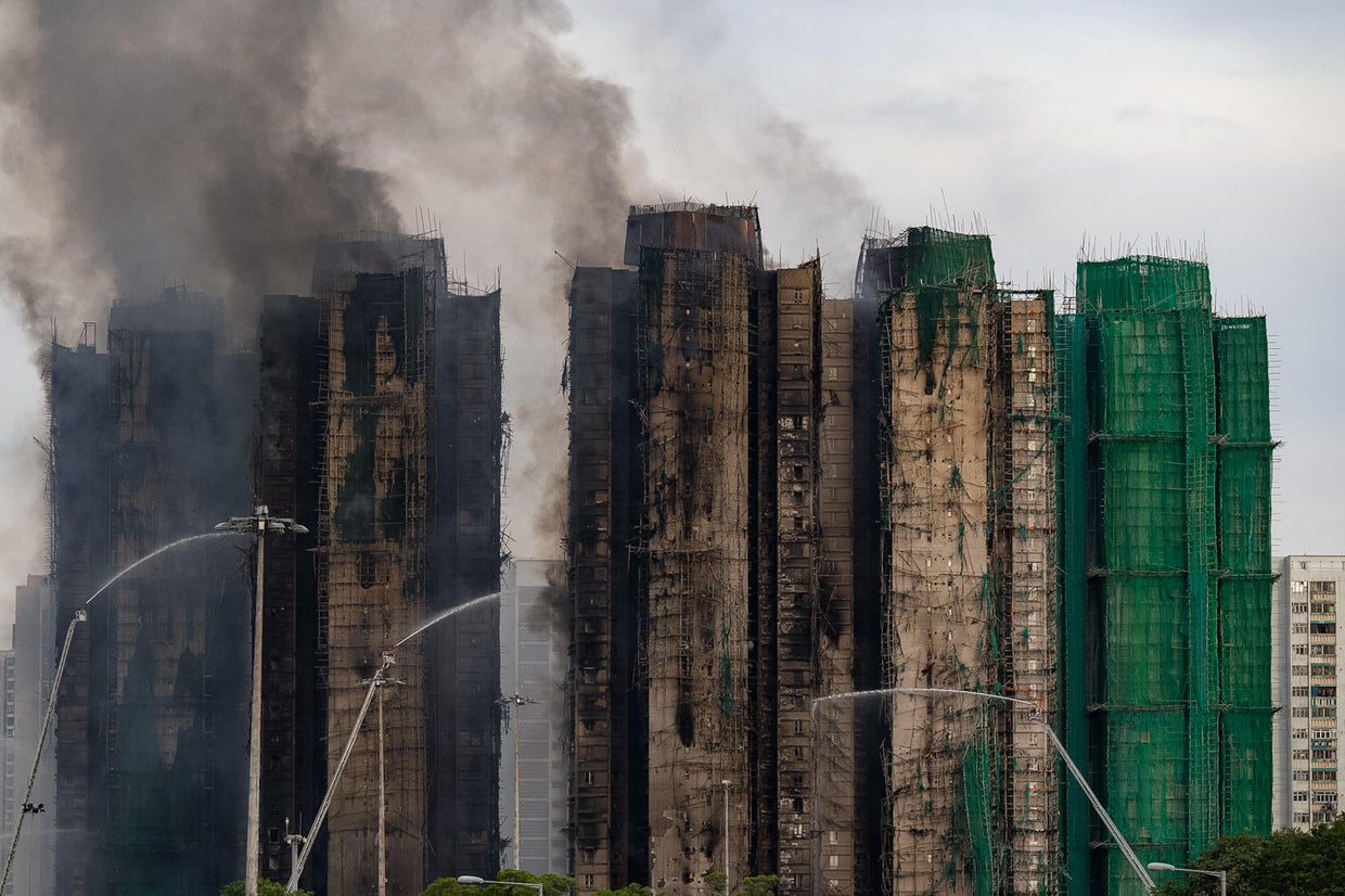 Fire in Hong Kong high-rise complex kills at least 94 people, hundreds ...