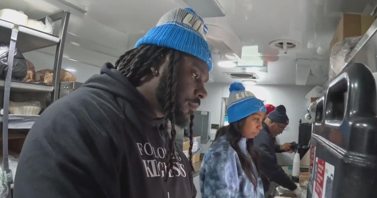 Detroit Lions player Miles Adams helps distribute meals - CBS Detroit
