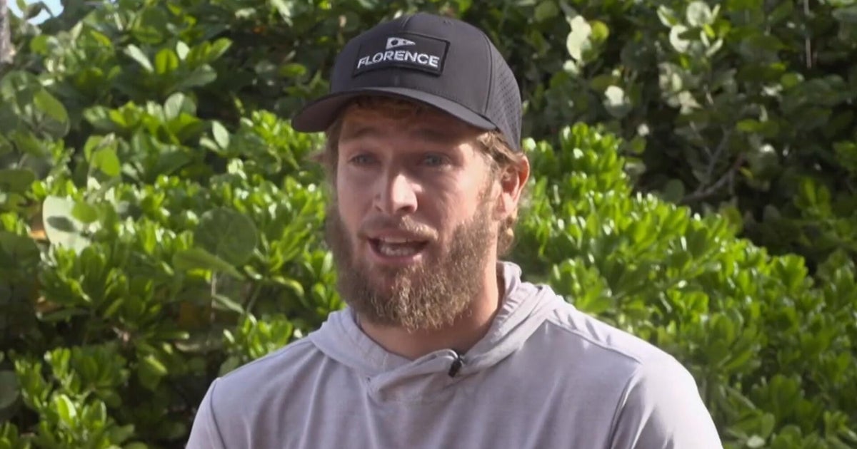 Surfer Nathan Florence shares fears as he conquers dangerous waves - CBS News