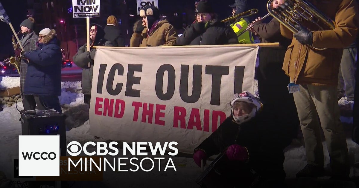 Group protests against ICE agents outside of Twin Cities hotel - CBS ...