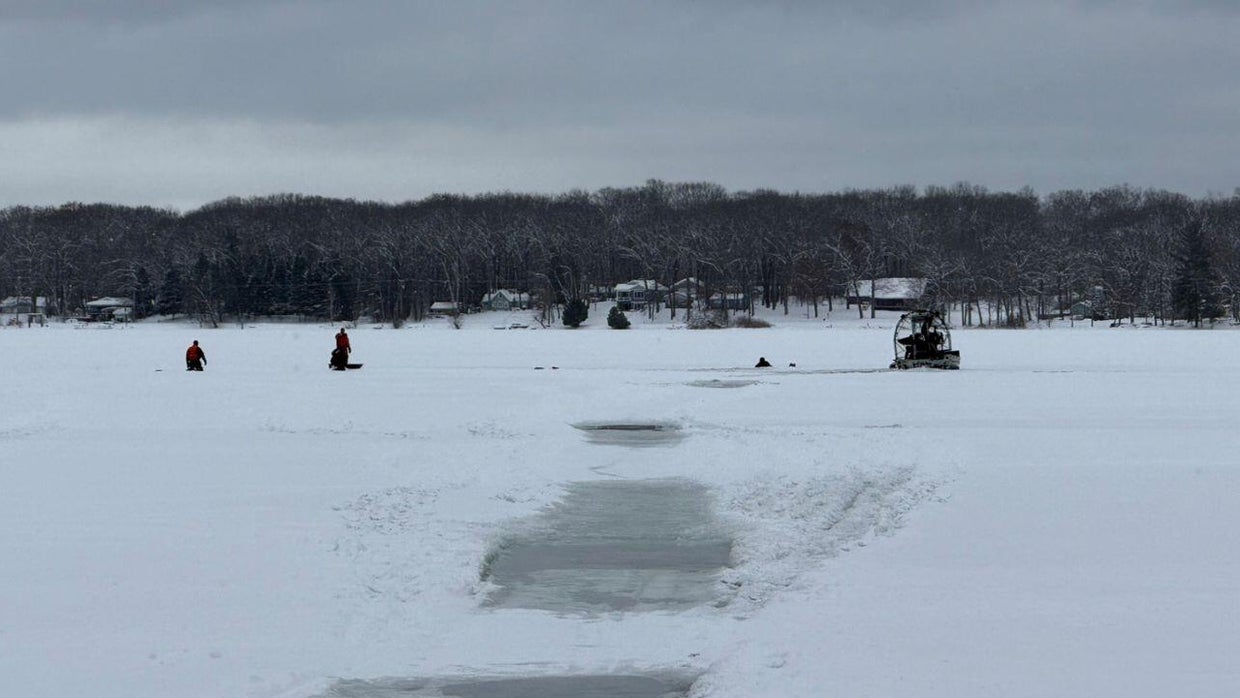 Bodies of two missing snowmobilers recovered in icy Michigan lake - CBS ...