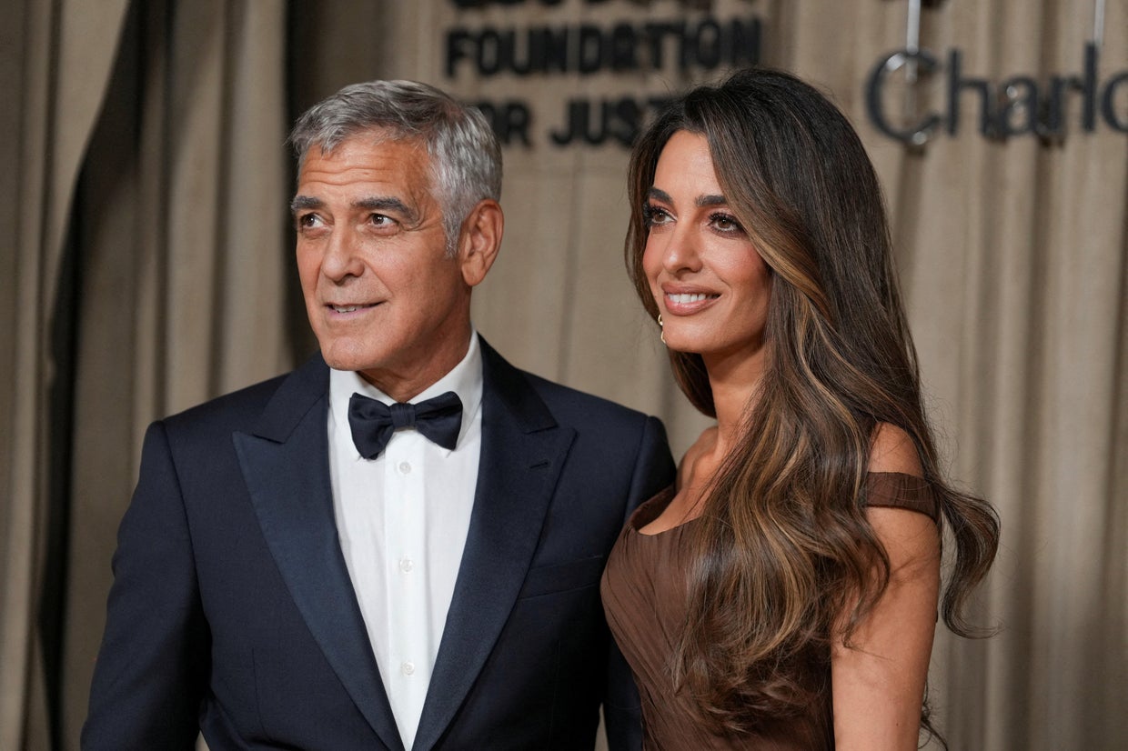 George Clooney, his wife Amal and their twins granted French ...