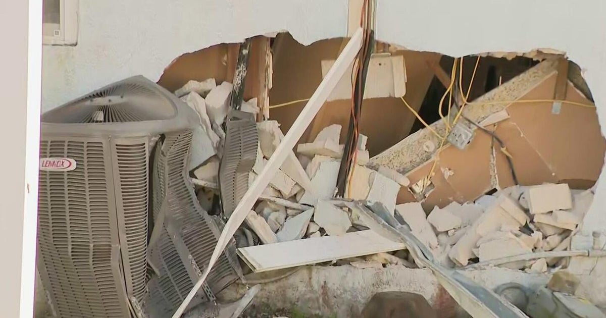 Truck slams into Broward home leaving damage behind - CBS Miami