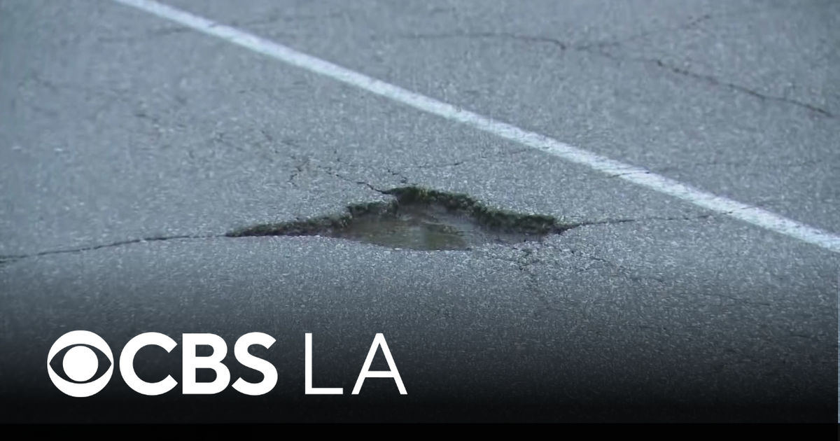Crews rush temporary repairs to LA County potholes amid rain - CBS Los ...