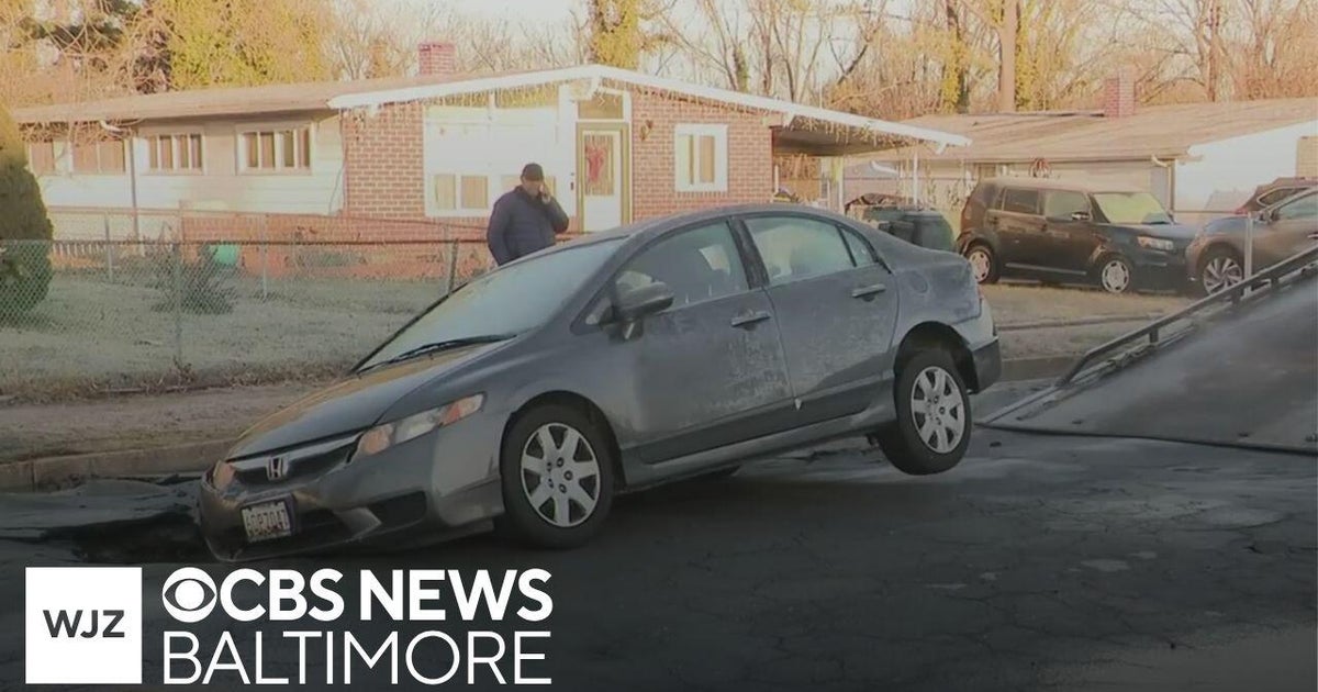 Watermain break causes flooding, sinkhole in Baltimore County - CBS ...