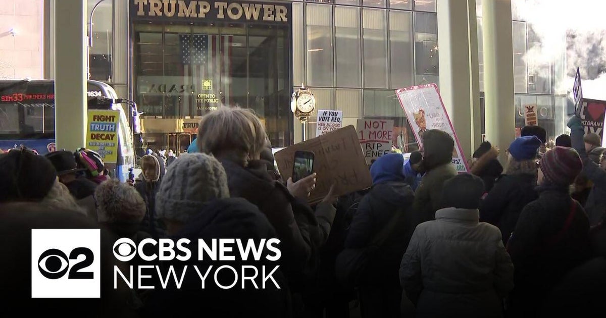 Protesters gather outside Trump Tower in NYC to mark 1st year of ...
