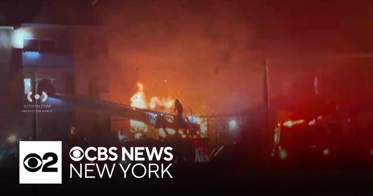 Unionport fire leaves at least 2 people injured - CBS New York