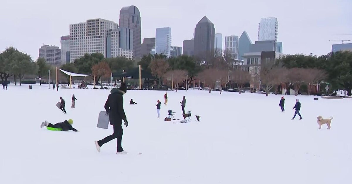Frigid temperatures, wintry mix bring sledding and smiles to Uptown ...
