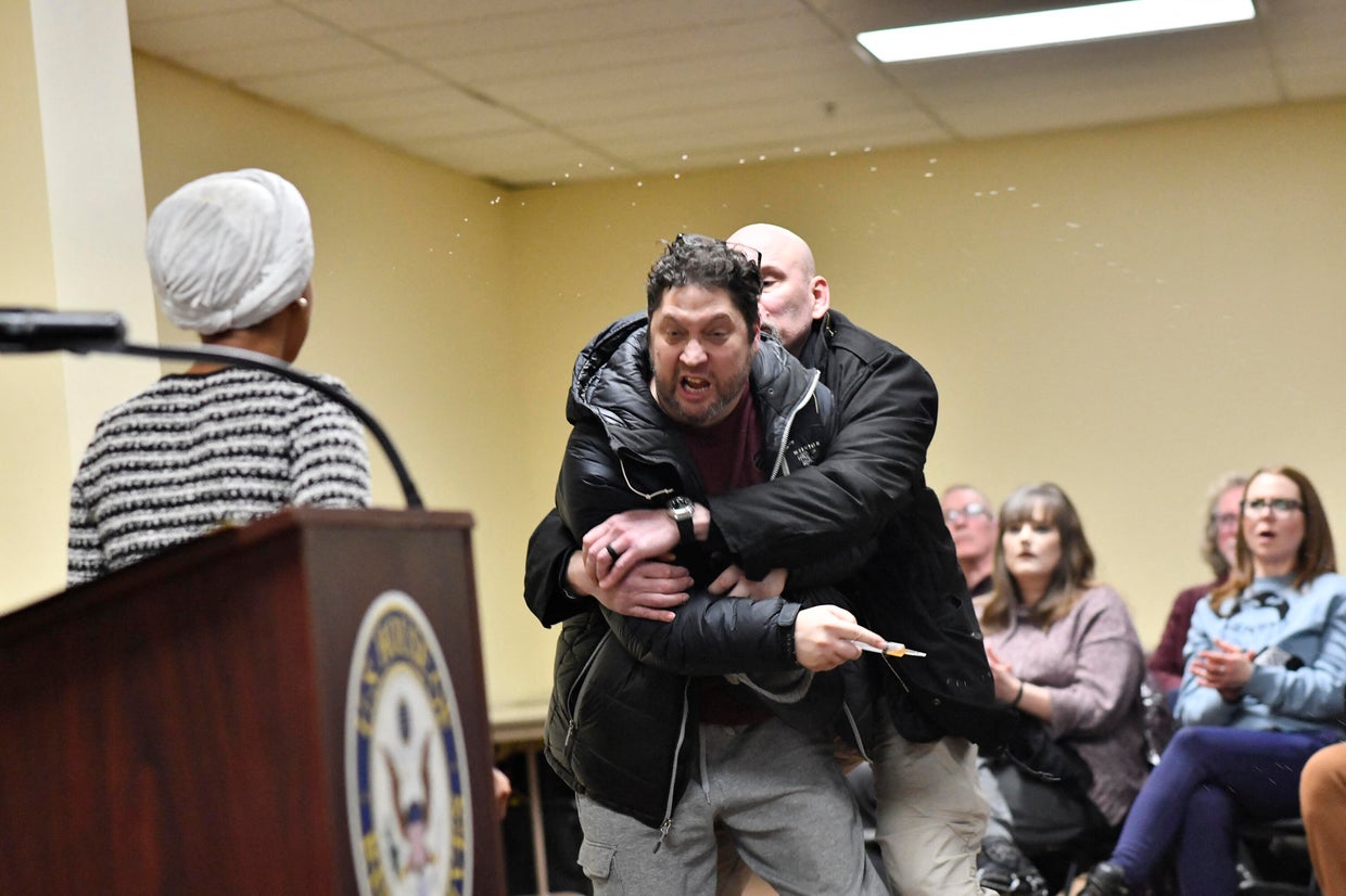 Man charges at Rep. Ilhan Omar and sprays her with substance at town ...