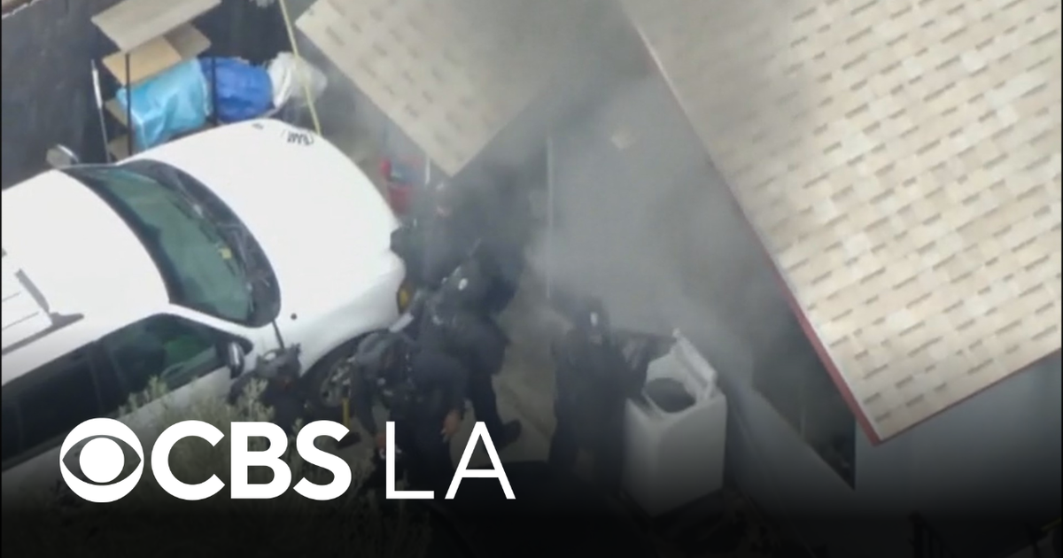 Pacoima home catches on fire during police standoff - CBS Los Angeles