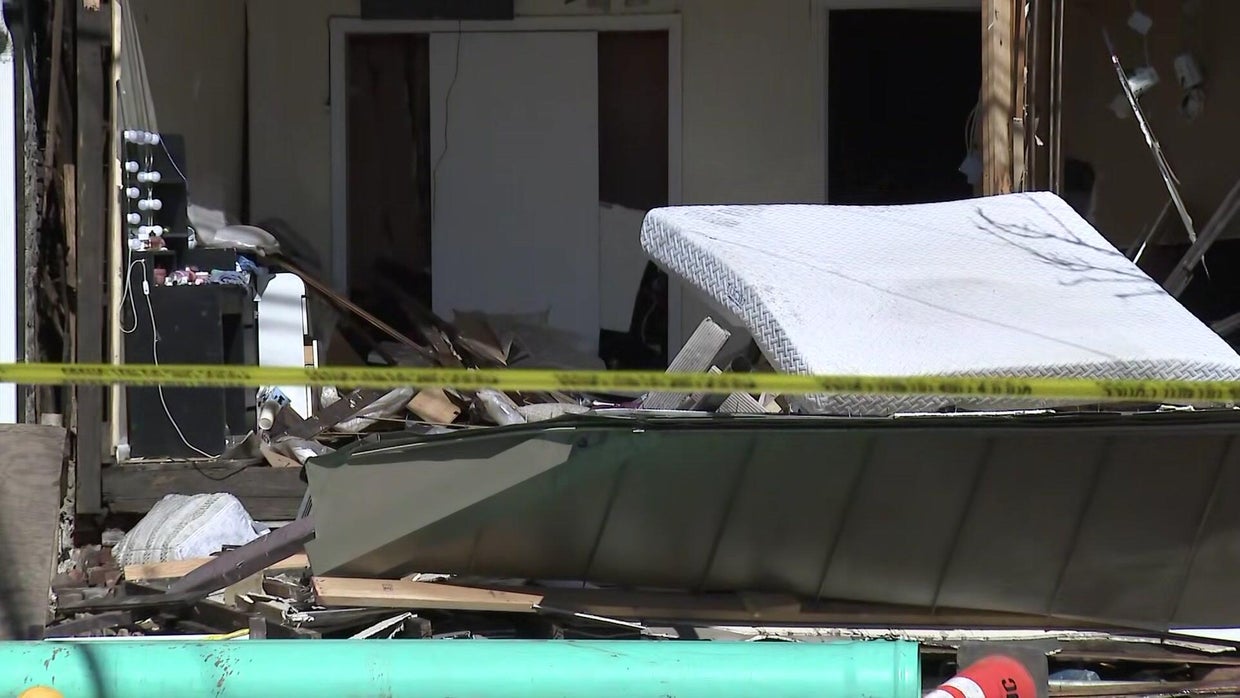 4 hurt in Newark when gas explosion tears facade off home - CBS New York