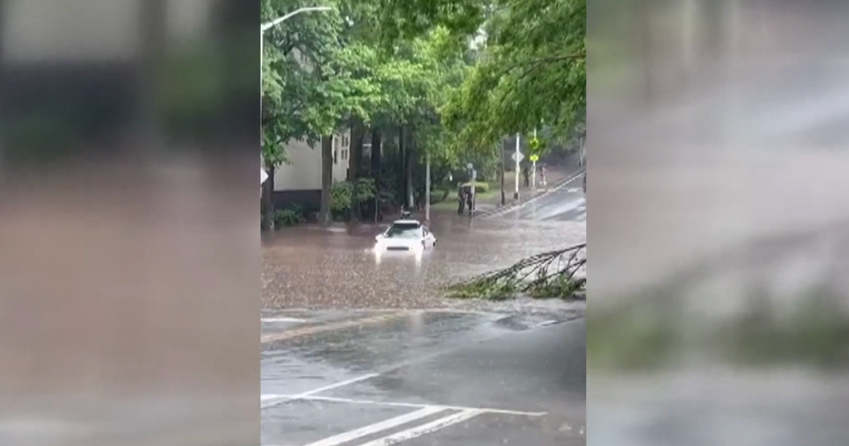 Waymo driverless car gets stuck in Atlanta flash flooding - CBS Atlanta