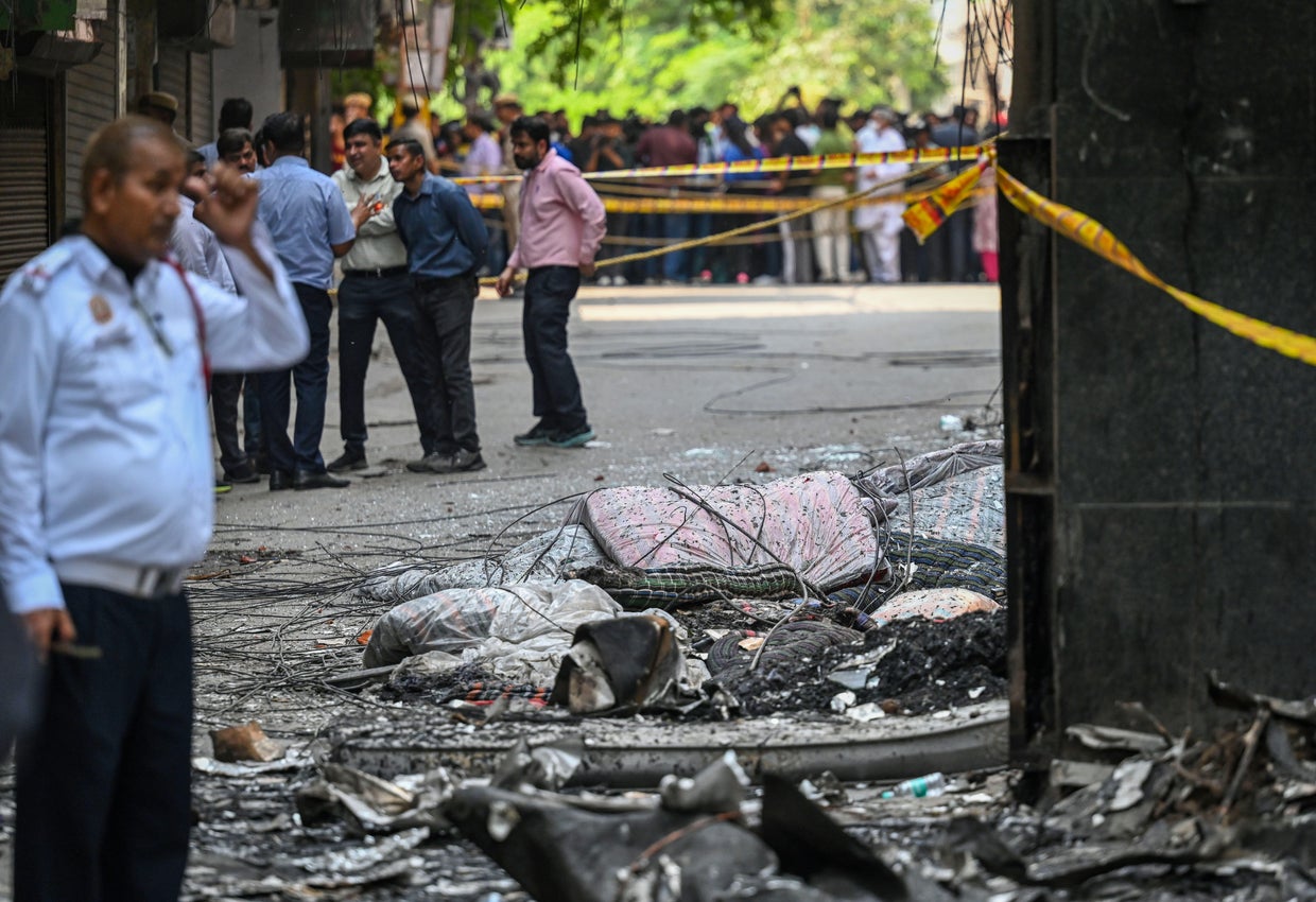 Fire tears through hotel in India's capital in Delhi, killing at least ...