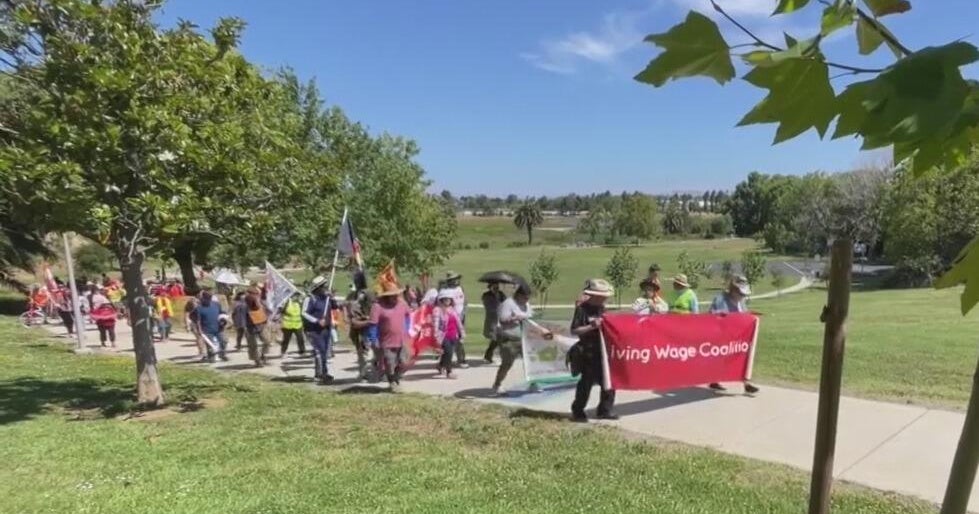 Marchers protest immigration enforcement with 50-mile walk across Bay ...